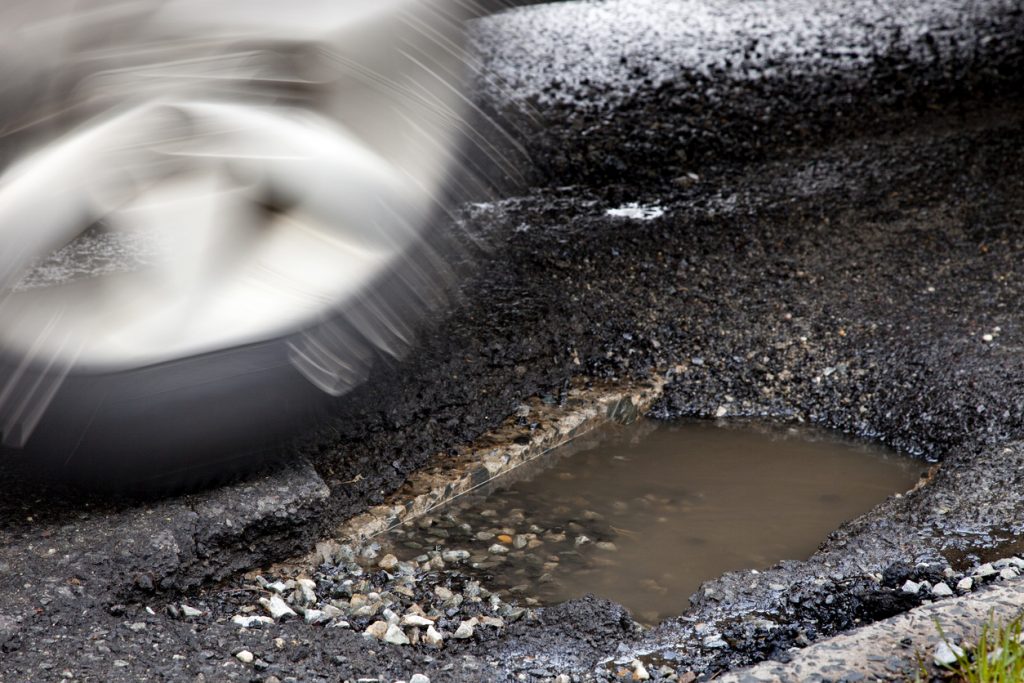 Pothole warning system: new virtual map to help drivers avoid car ...